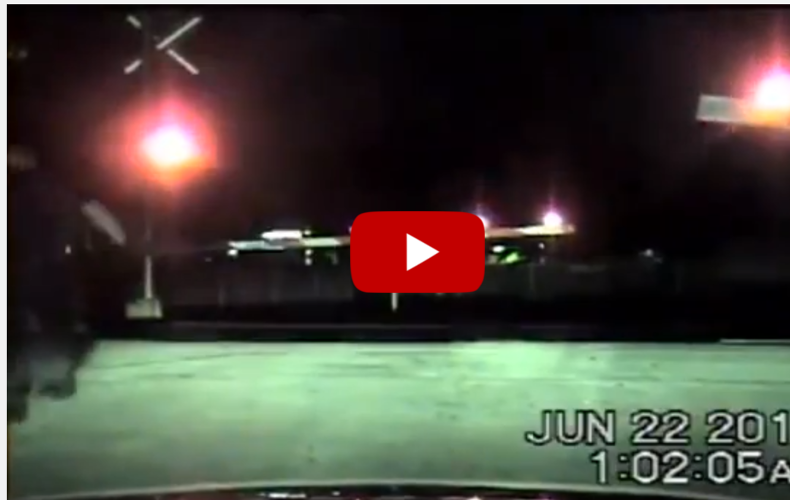 DASHCAM: Texas Cop Rescues Woman Lying on Train Tracks Seconds Before ...