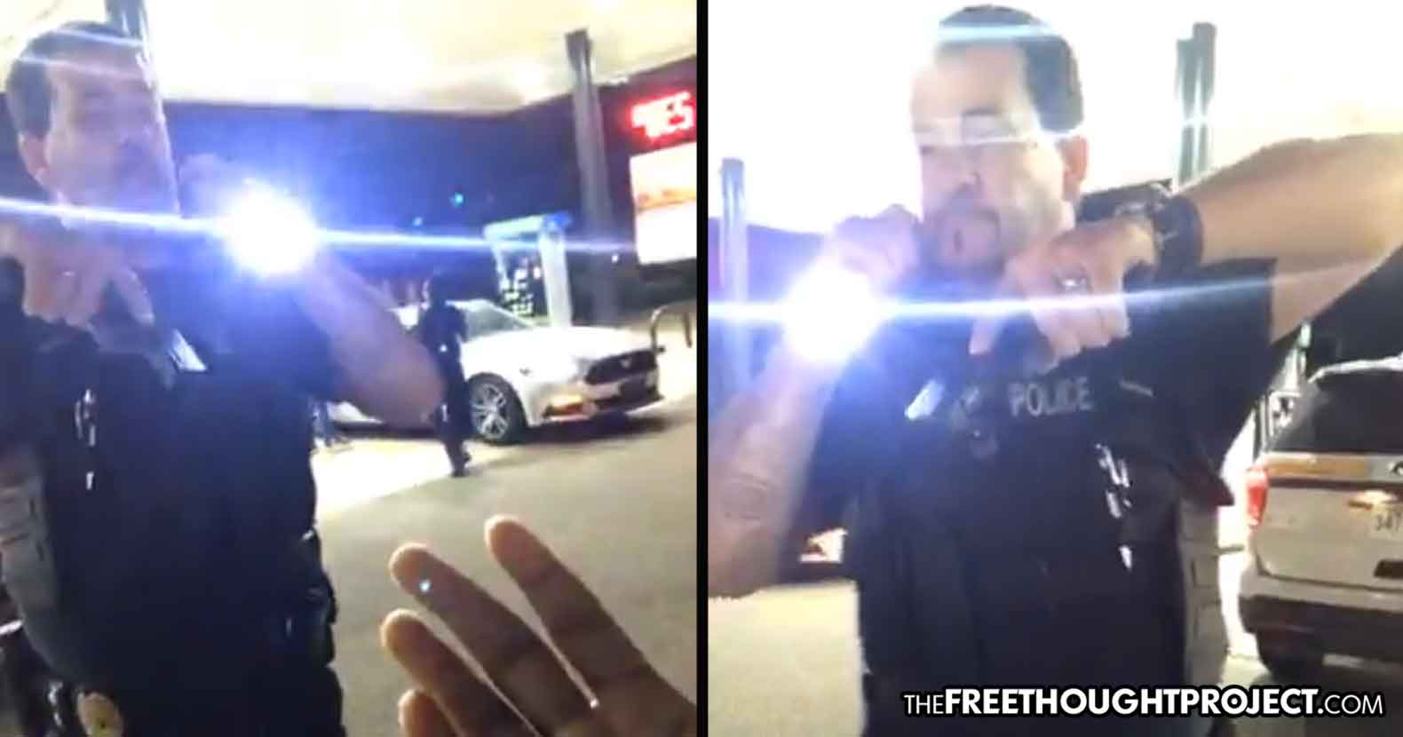 WATCH: Crazed Cop Holds Man at Gunpoint for Not Leaving Gas Station ...
