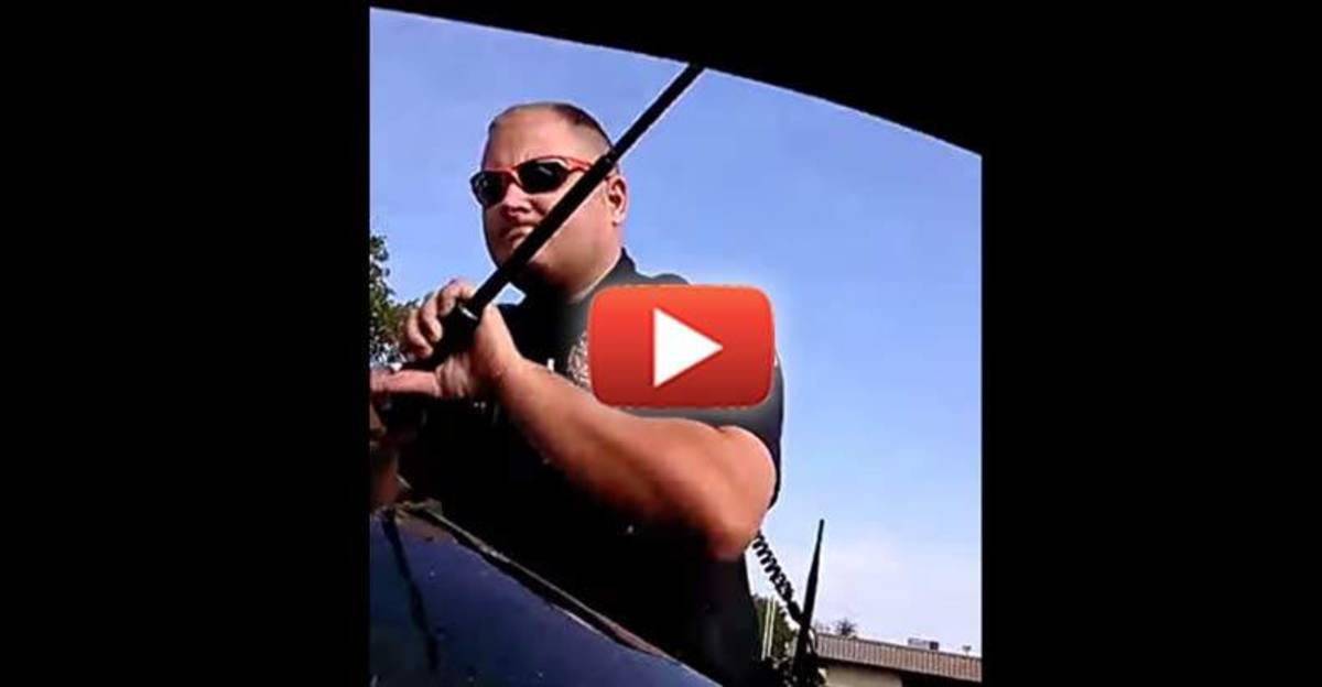Cop Smashes Man's Window Pulls Him from the Car for Refusing to Show ...