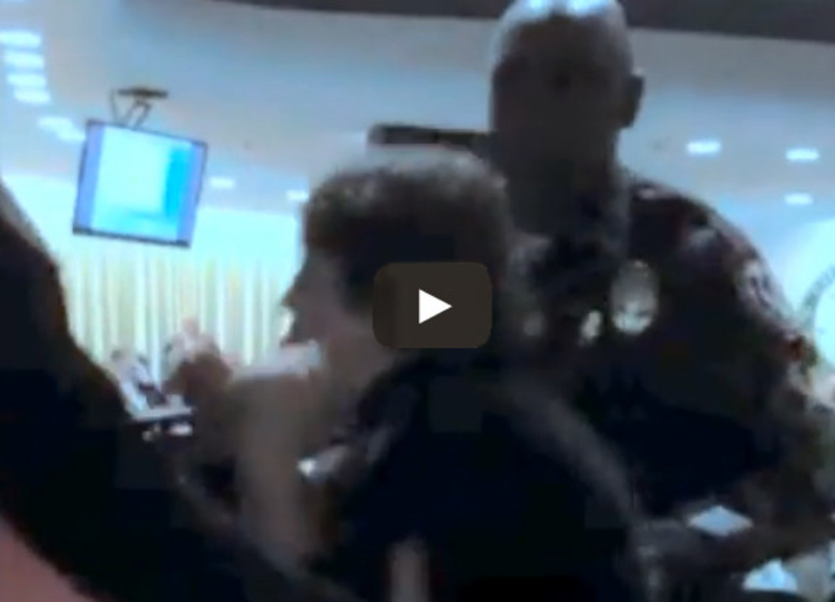 Woman Arrested for Clapping at Town Hall Meeting - The Free Thought Project