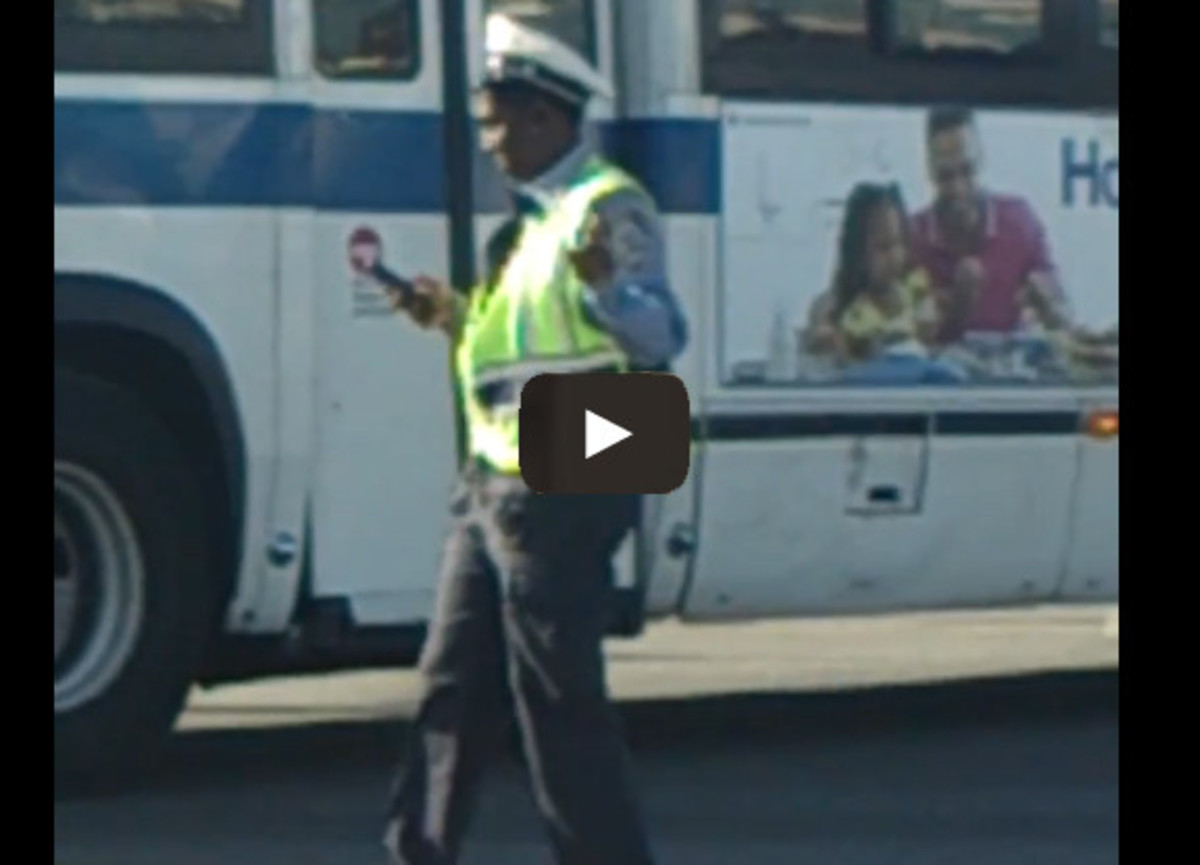 OMG! Is that Cop Texting While Directing Traffic? - The Free Thought ...