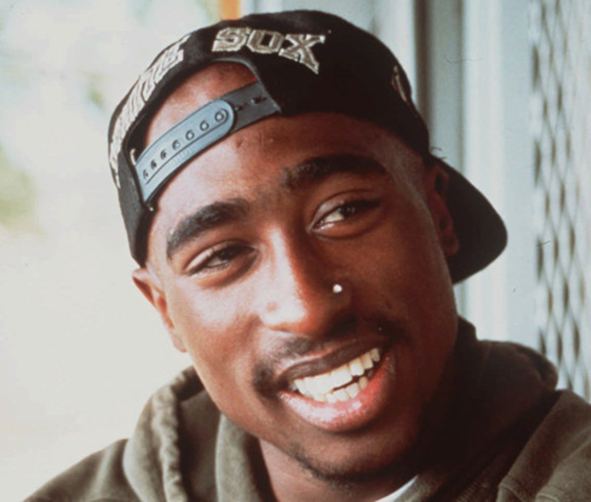 The Reason Why Tupac Shot 2 Police Officers and Wasn't Charged - The ...